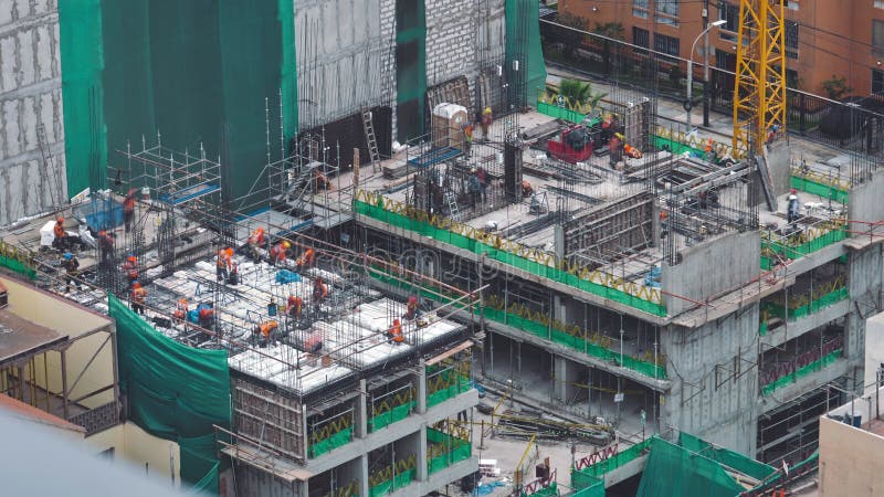 Hyperlapse of Cranes and Workers Working on Construction Site. Advanced ...