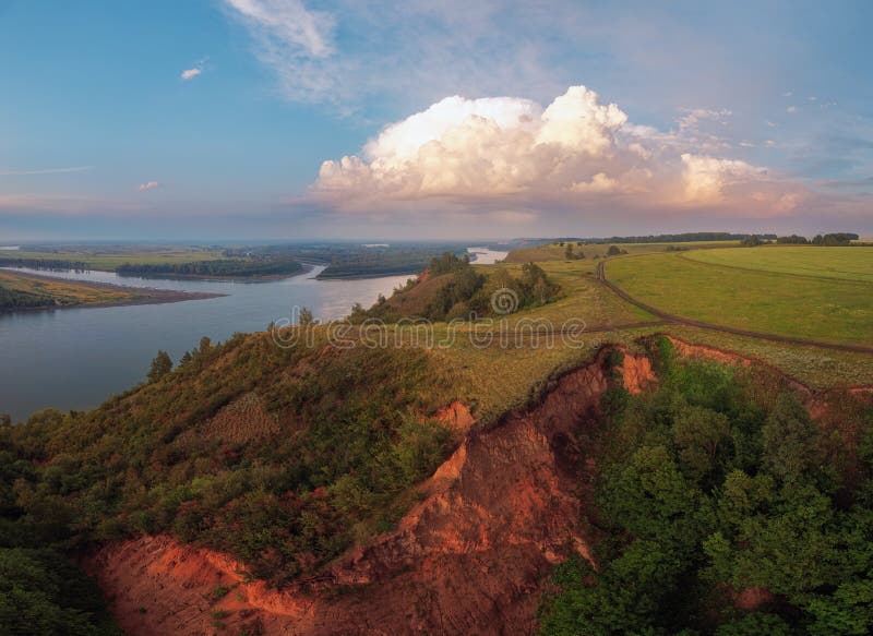 A High Bank of Clay with Fields and Trees, Clouds Stock Image - Image ...