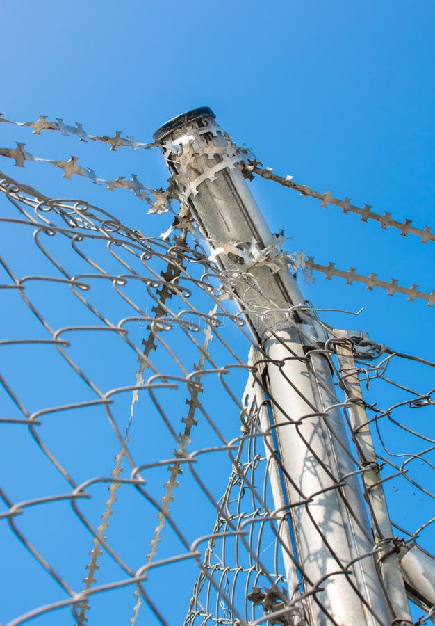 Dangerous Barbed Wire Fence Stock Photo - Image of closed, danger: 38810382