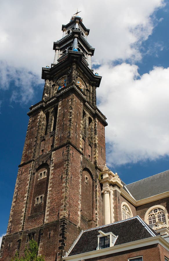 High Brick Bell Tower Against the Sky with Clouds. Stock Image - Image ...