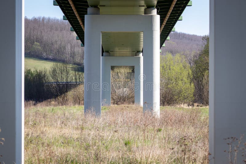A high bridge from below stock photo. Image of environment - 187729028