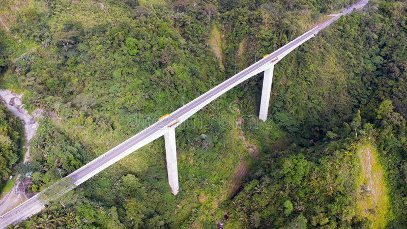 The High Bridge among Tropical Mountains. Agas Agas Bridge Stock Image ...