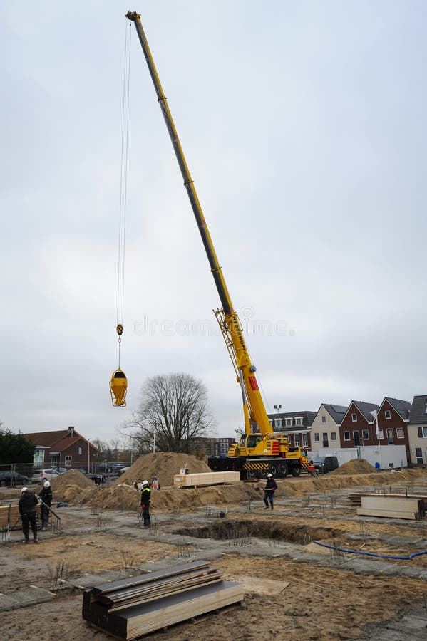 High Building Crane at a Construction Site Editorial Photo - Image of ...