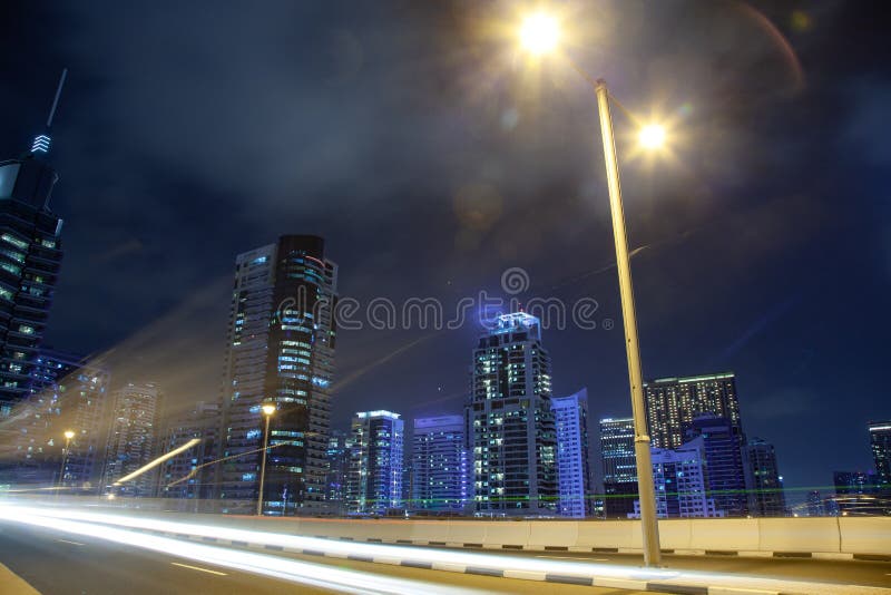 High Buildings with Road at Night Stock Image - Image of background ...