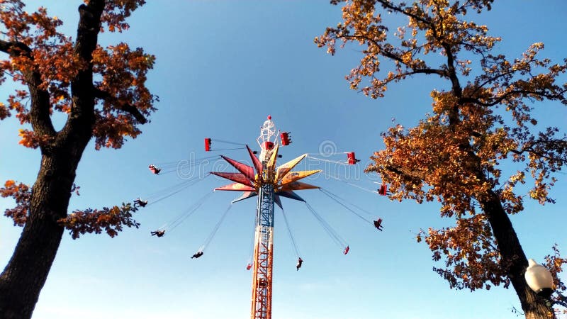High Carousel in an Attraction on Sky Background Stock Footage - Video ...