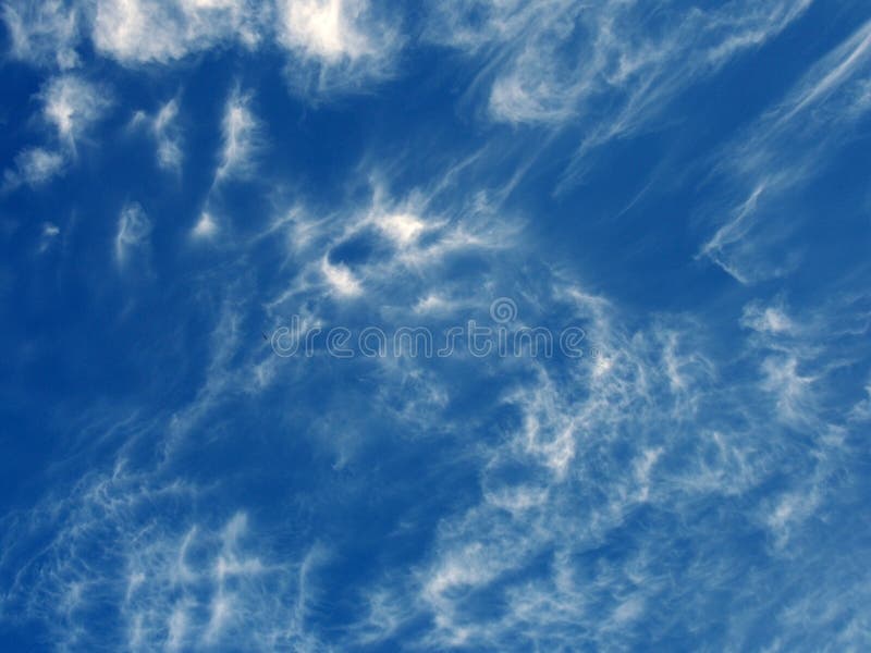 High Cirrus Clouds in a Deep Blue Summer Sky Stock Photo - Image of ...