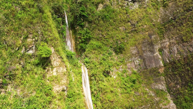 High Cliff with a Waterfall. a Stream of Water from a Cliff in the ...