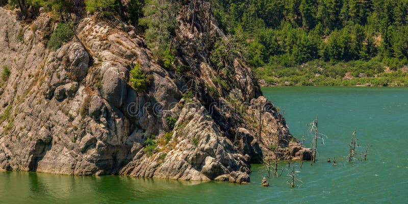 High Cliffs, Forest and Dried Trees by the Lake Stock Photo - Image of ...