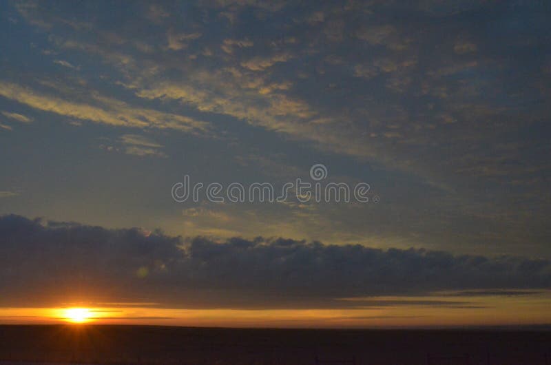 Sunsetting high clouds stock photo. Image of setting - 321837480