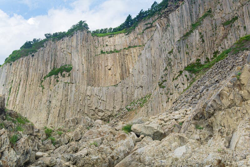 High Coastal Cliff Formed by Stone Columns, Cape Stolbchaty on the ...