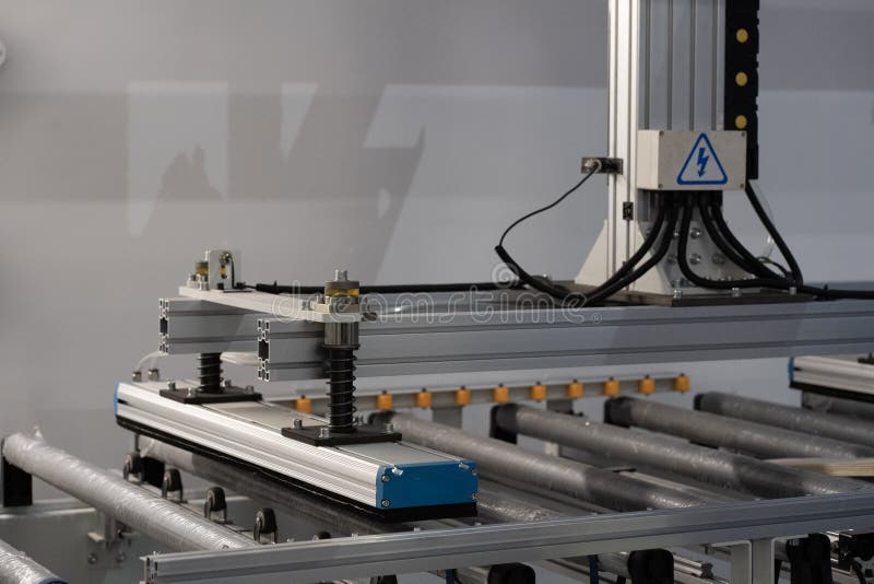 Automated Factory Machine with Cable Assembly and Conveyor Rollers ...