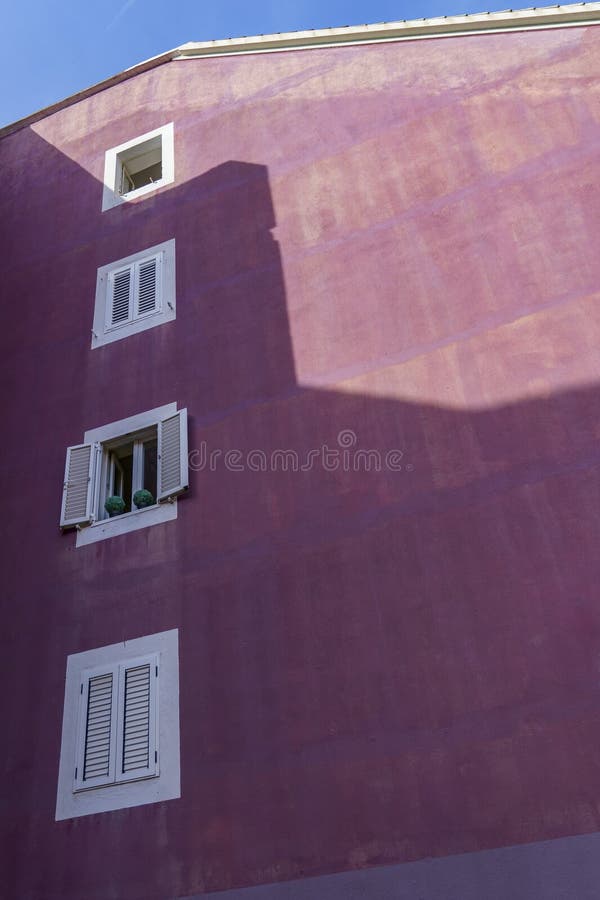 A High Elevation with Four Windows in a Beautiful Color with Shadows ...