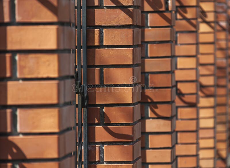 High Fence with Brick Columns. Decorative Hedge Stock Photo - Image of ...