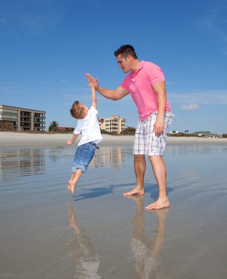 High five stock image. Image of father, adults, attractive - 8450339