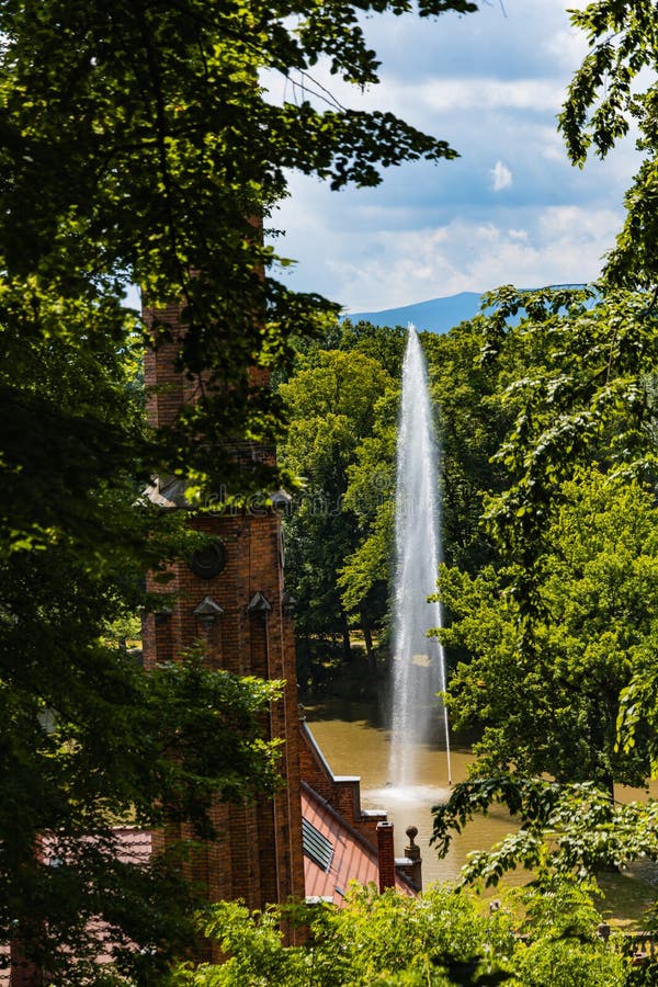 High Fountain in Small Lake in Valley in Park Stock Image - Image of ...