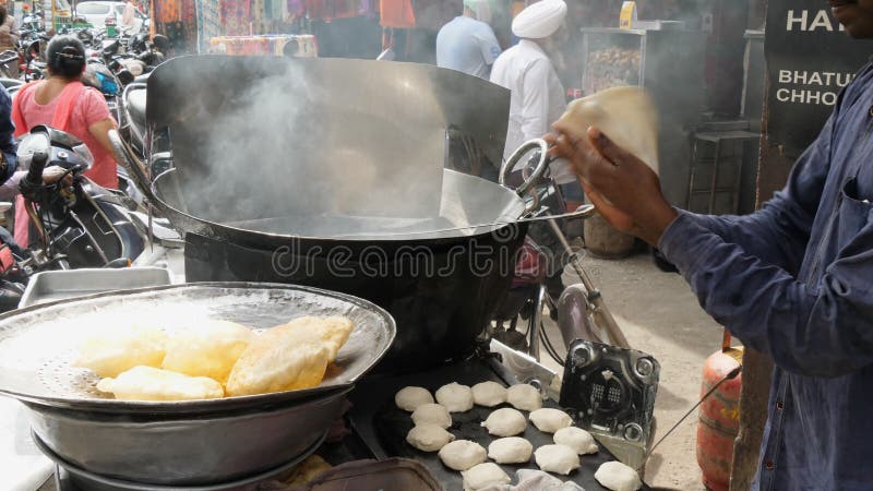 High Frame Clip of a Cook Making Poori Bread in Amritsar Stock Video ...