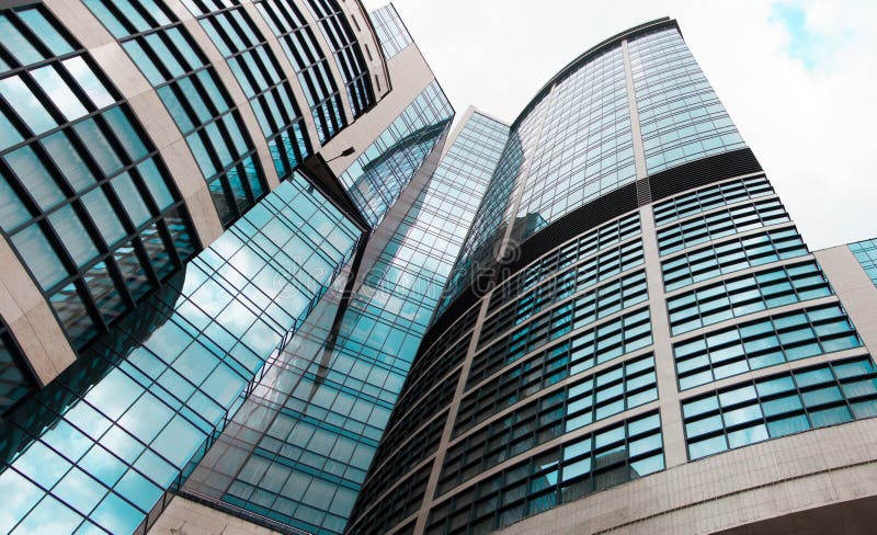 High Glass Office Building with Clouds. Background Stock Photo - Image ...