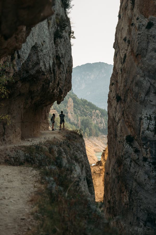 A High Gorge with People Taking Photos of Canyon on the Path Inside the ...