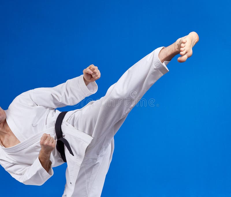 High Kick Athlete is Beating with a Black Belt Stock Photo - Image of ...