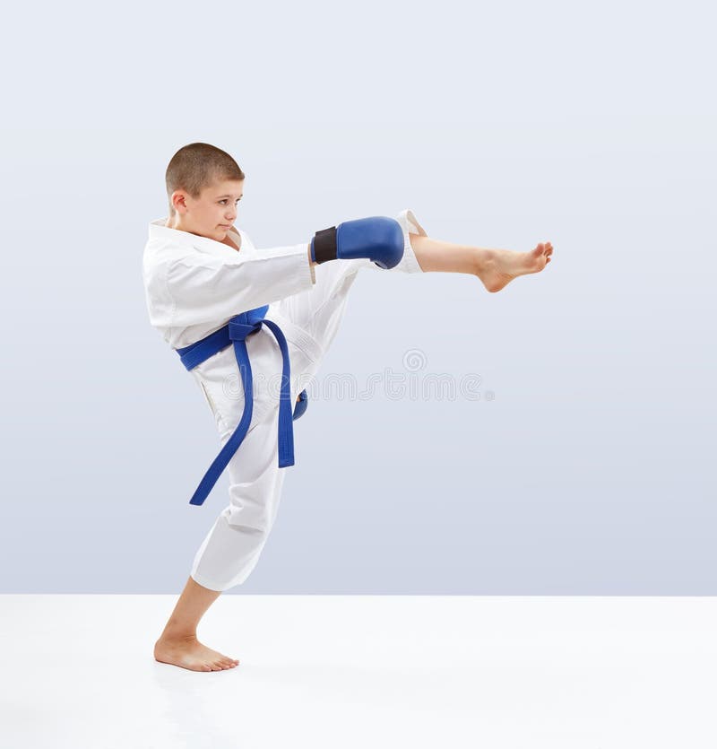 High Kick Forward Karateka is Beating in Karategi Stock Photo - Image ...