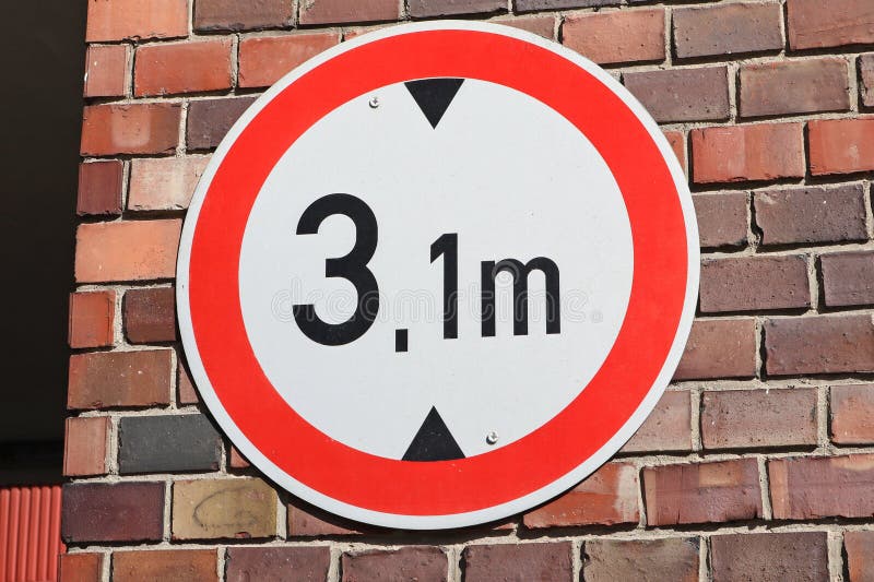 High Limitation Road Sign on the Brick Wall Stock Photo - Image of ...