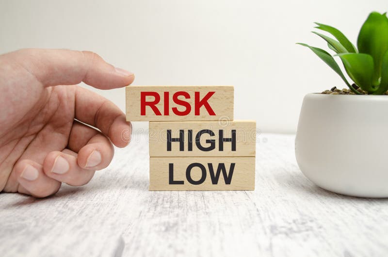 HIGH and LOW; Wooden Blocks with HIGH LOW Text of Concept Stock Photo ...