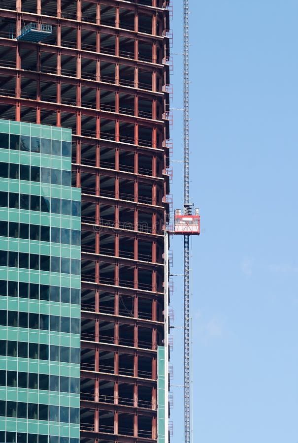 High Modern Building with Outside Construction Ele Stock Image - Image ...