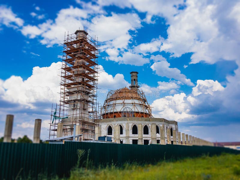 A High Mosque Under Construction, Surrounded by Scaffolding. Stock ...