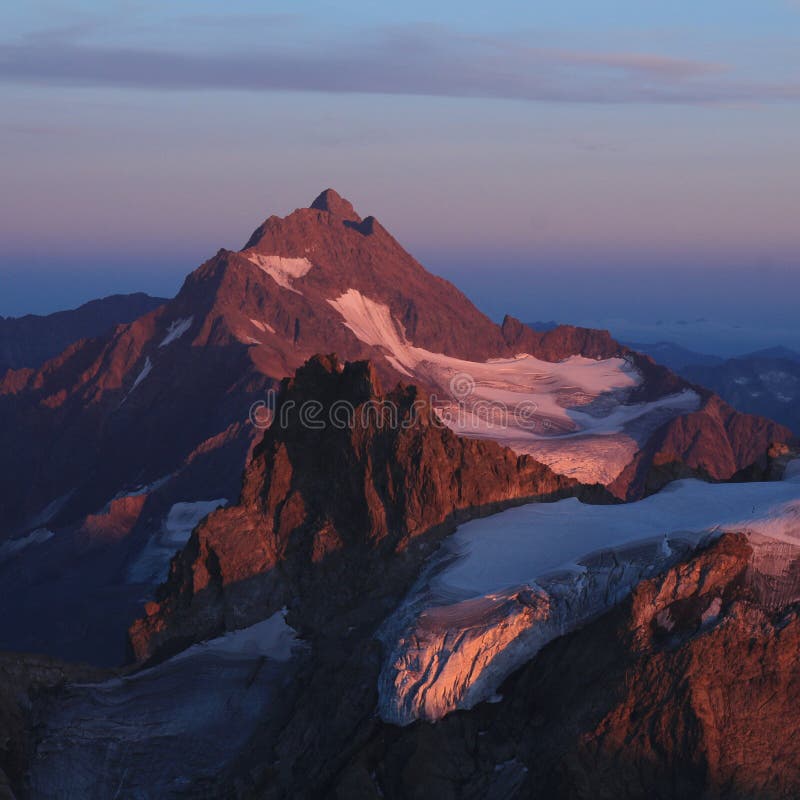 High Mountain in Purple Evening Light, View from Mount Titlis Stock ...
