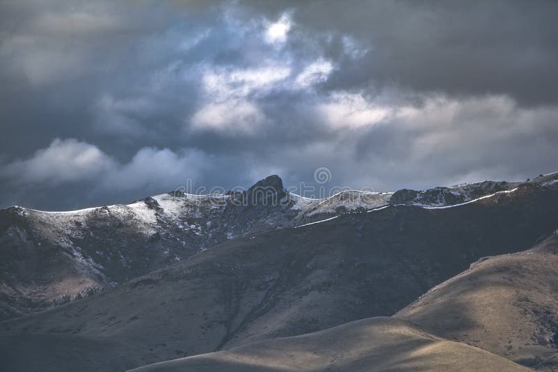 High Mountains on the so Cloudy Sky Background Stock Image - Image of ...