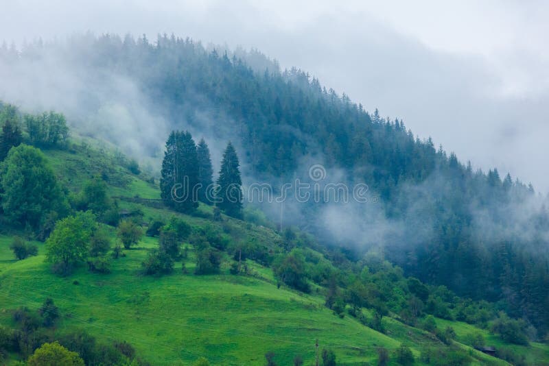 High Mountains in Spring with Fog Stock Photo - Image of mountains ...