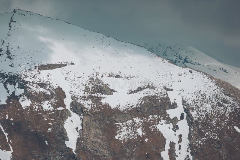 High Mountains Under Snow with Light and Shadow. Mountain Peak Stock ...