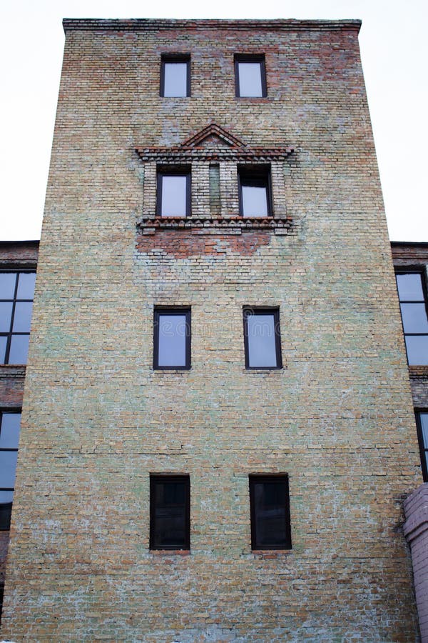 High Old Building of Red and Yellow Bricks Stock Photo - Image of ...