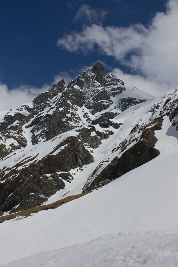 High peak stock image. Image of rocks, peak, slope, blue - 66527667