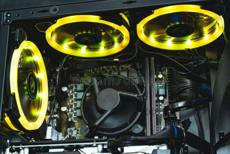 Computer Circuit Board and CPU Cooling Fans Illuminated by Internal LED ...