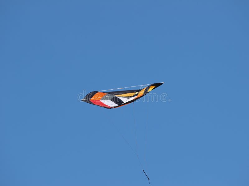 High Performance Kite Flying in Blue Sky Stock Photo - Image of ...