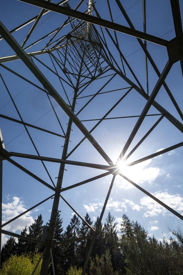 High Power Pylon and the Sun Stock Photo - Image of electricity, energy ...