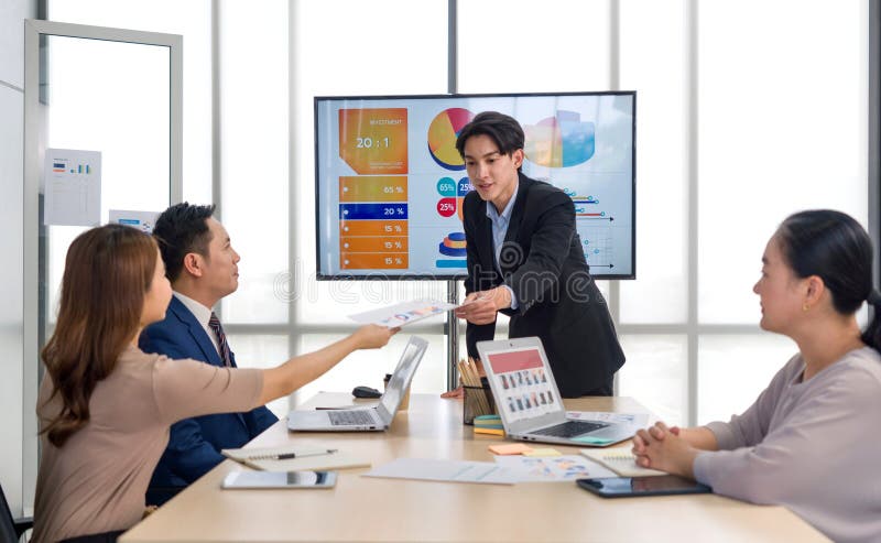 High-powered Business Professional Discussing Strategic Plan and Making ...