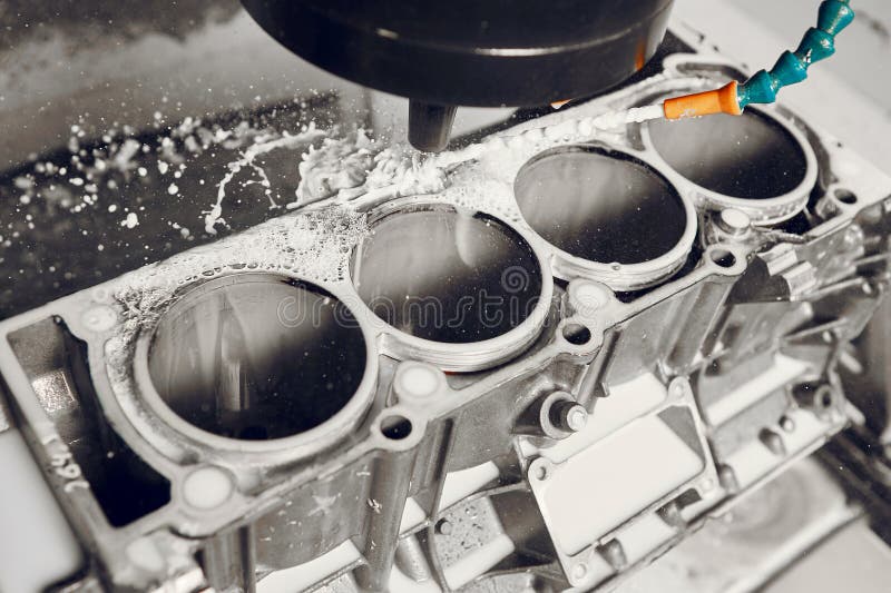 High Precision Cnc Milling Machine Makes Holes in the Car Engine. Stock ...