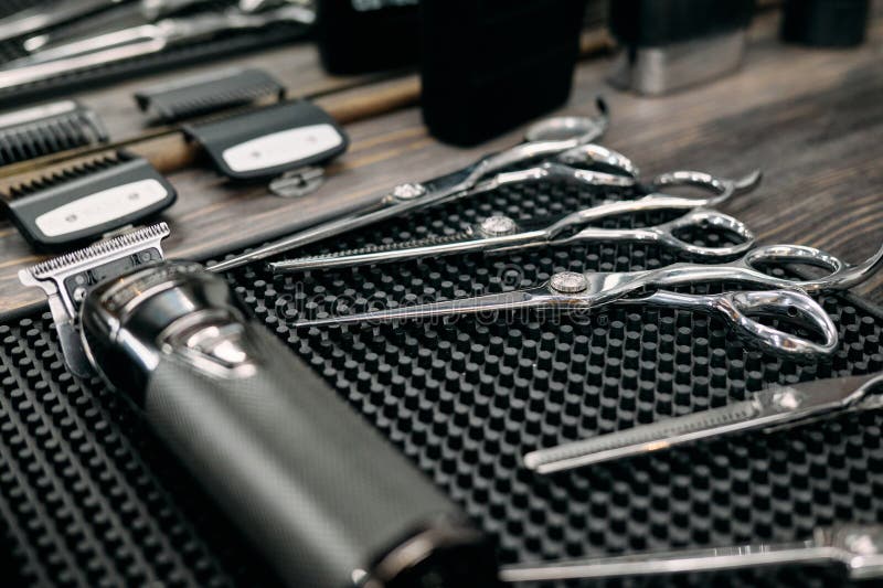 High-quality Barber Tools Including Scissors and Clippers are Organized ...