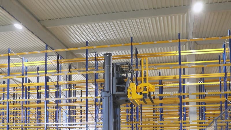 Forklift High Rack Stacker stock video. Video of warehouse - 192566017