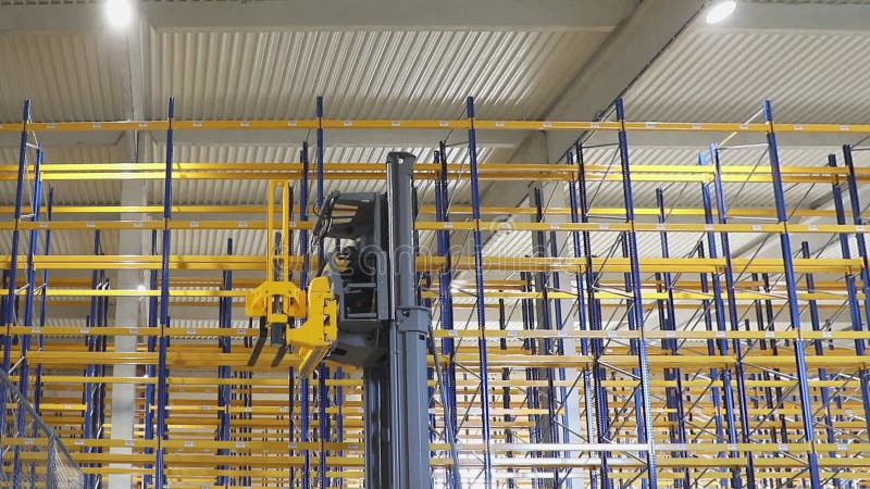 Forklift High Rack Stacker stock video. Video of warehouse - 192566017