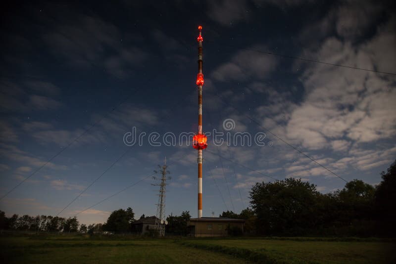 High radio tower at night stock photo. Image of forest - 60197602