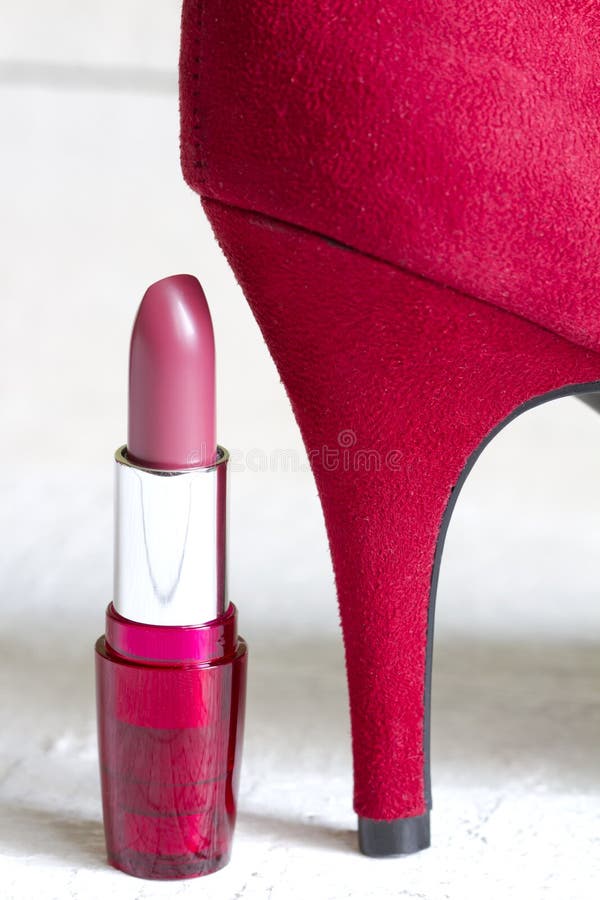 High Red Heels and Set of Cosmetics Stock Photo - Image of crushed ...