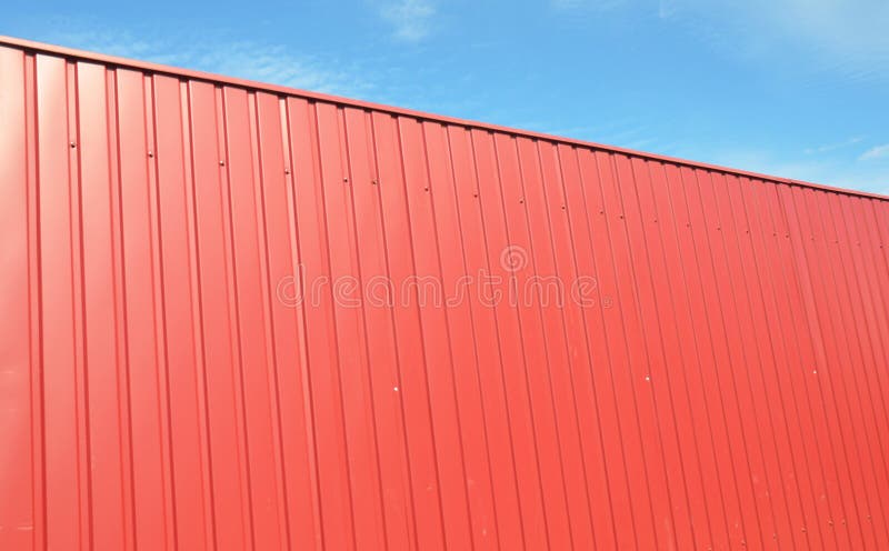 A High Red Privacy Fence from Metal Profile Fence Panels Stock Photo ...