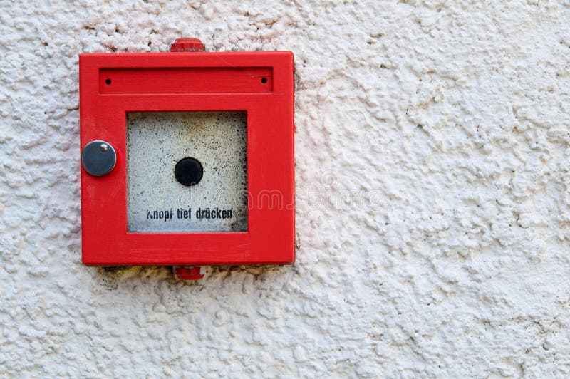 High-resolution Closeup of a Manual Red Fire Detector Positioned on the ...