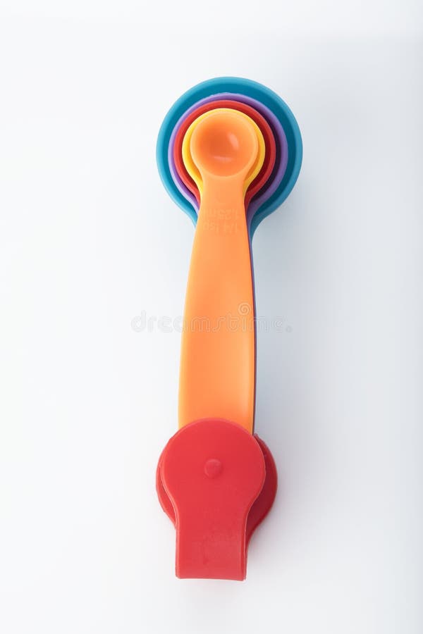 Colored measuring cups stock image. Image of measure - 27360407