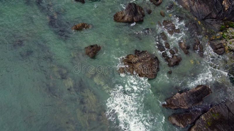 A High-resolution Image of a Rocky Coastline with Contrasting Shades of ...