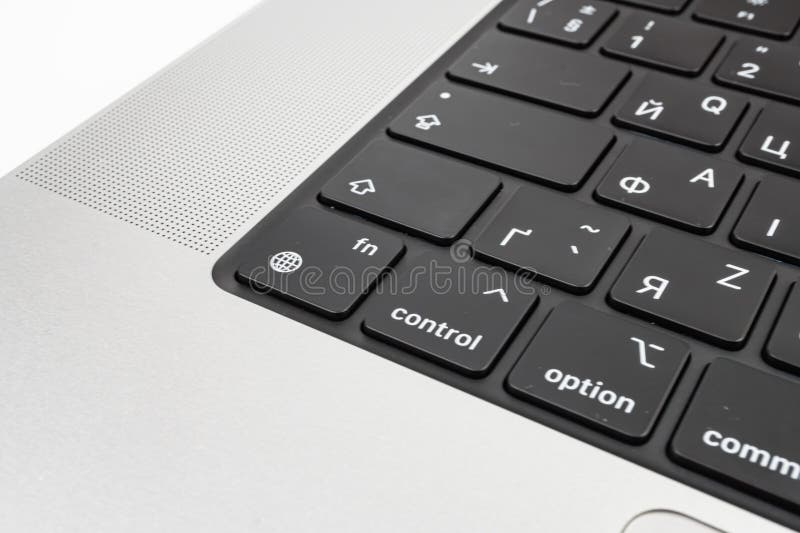 A High-resolution Image of a Sleek, Backlit Laptop Keyboard in Low ...