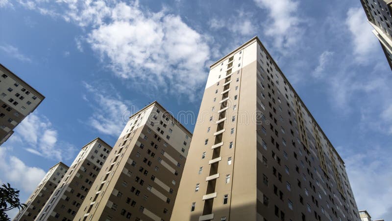 High Rise Apartment Building Complex with Blue Sky Stock Image - Image ...